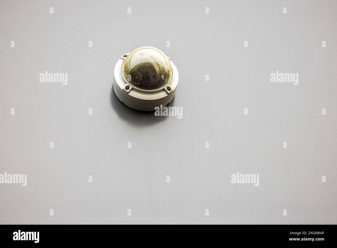 Close-up view of industrial building with outdoor surveillance camera ...