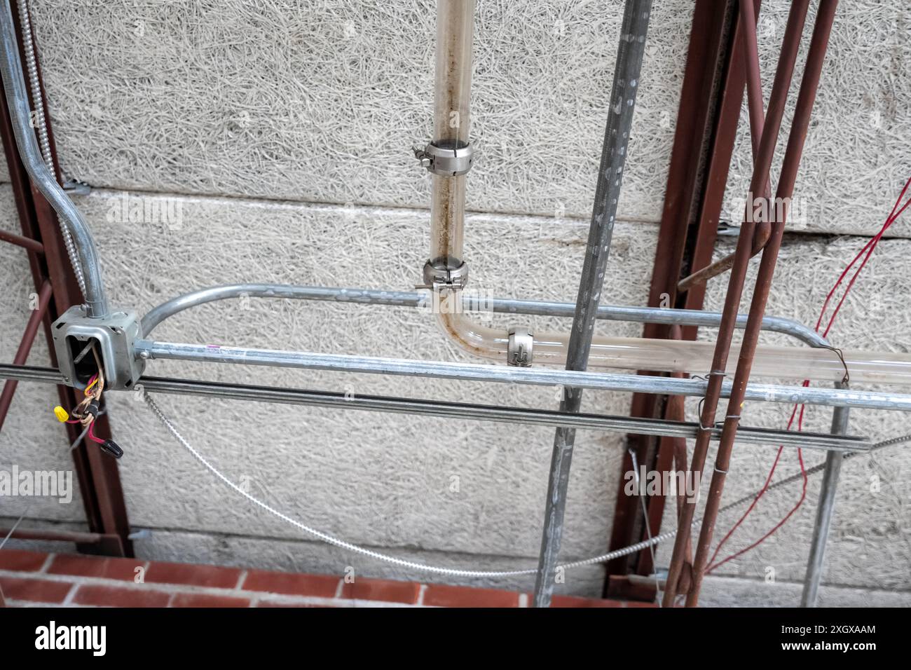 Old ceiling mounted glass drain, vent, pipes in school science room or ...