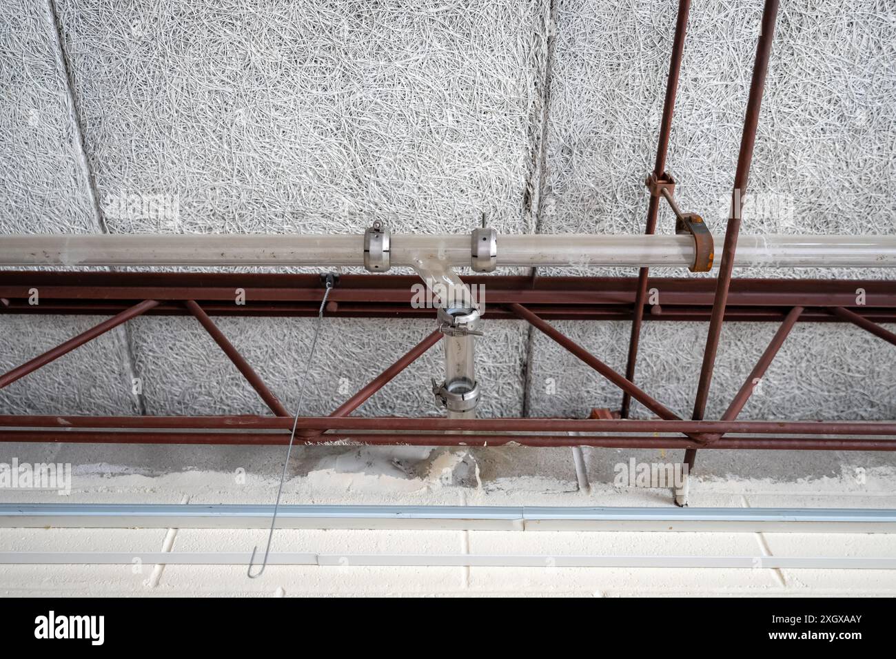 Old ceiling mounted glass drain, vent, pipes in school science room or ...