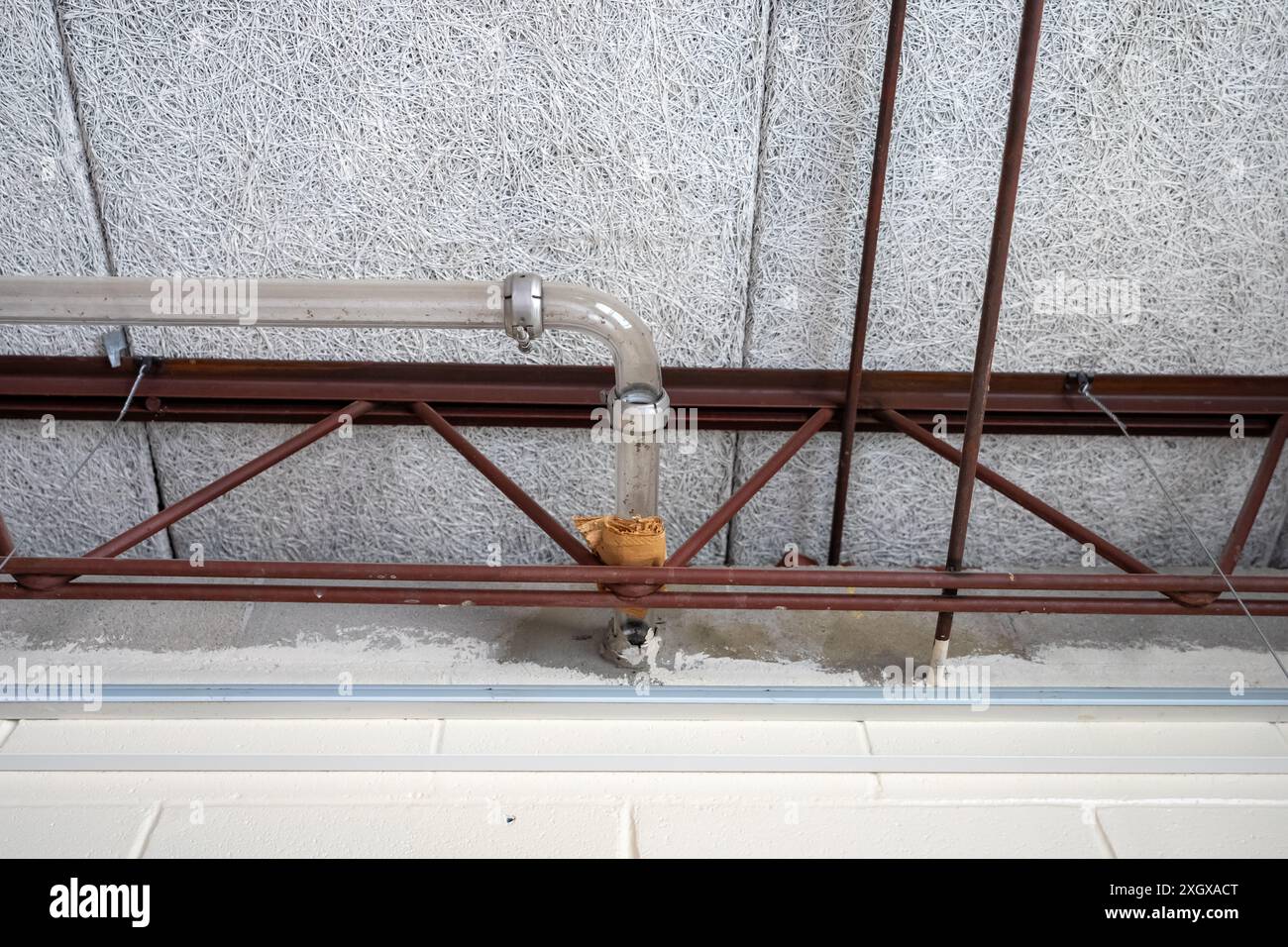 Old ceiling mounted glass drain, vent, pipes in school science room or ...