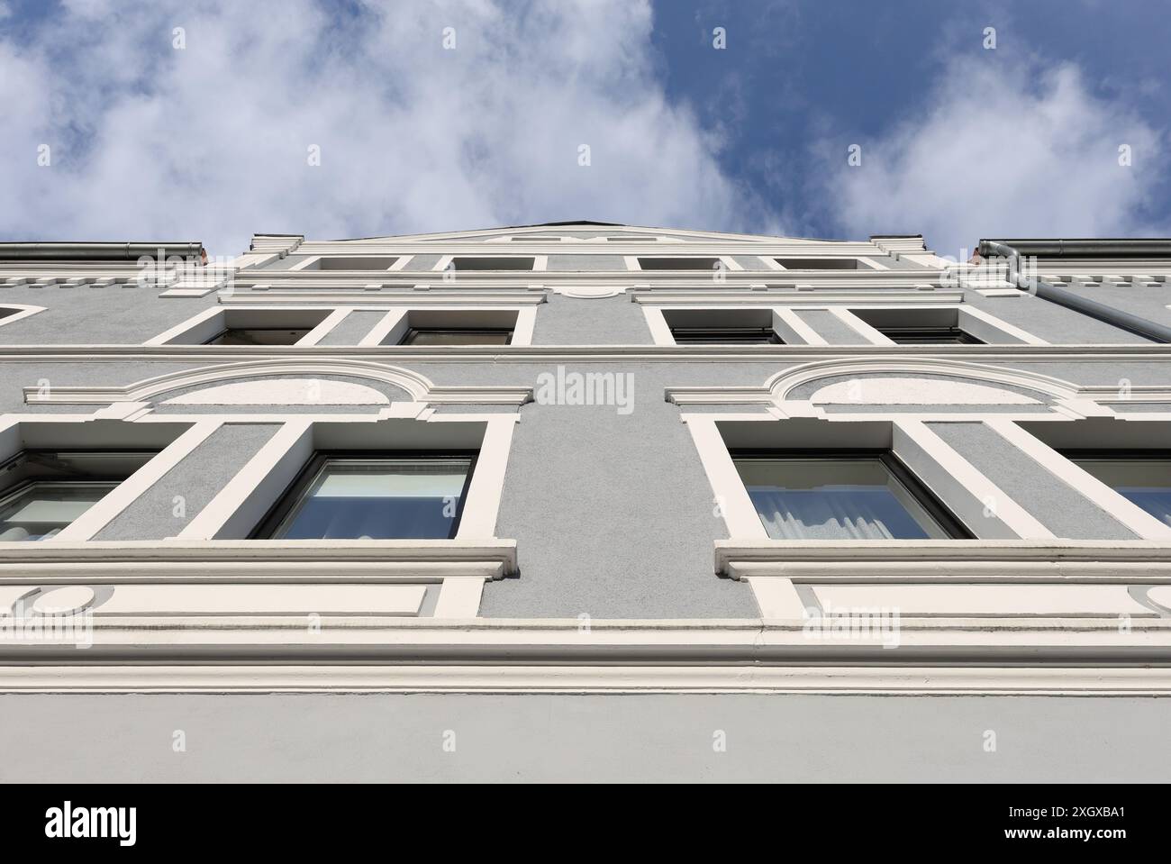 Residential building, light grey with white ornaments, extreme frog ...