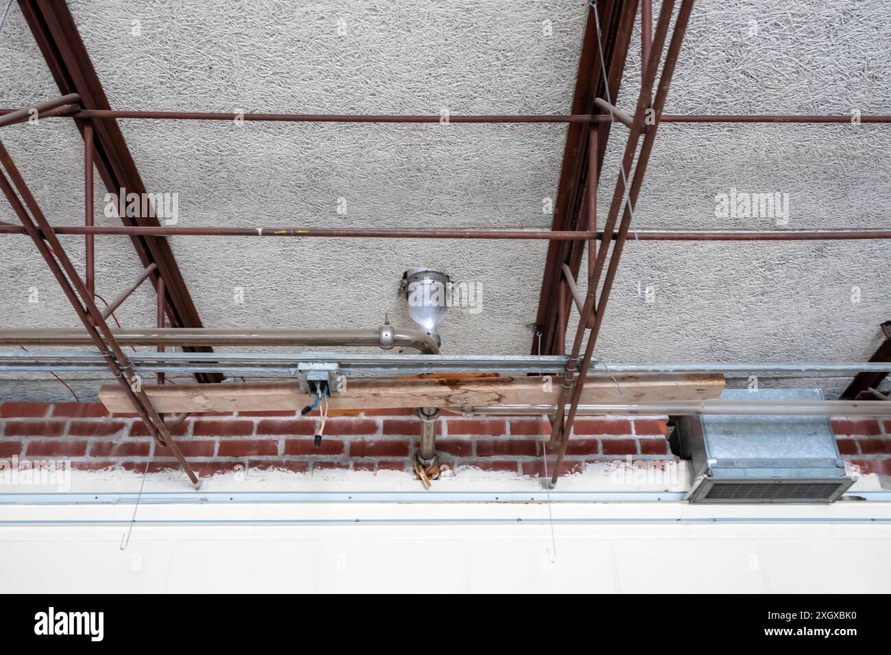 Old ceiling mounted glass drain, vent, pipes in school science room or ...