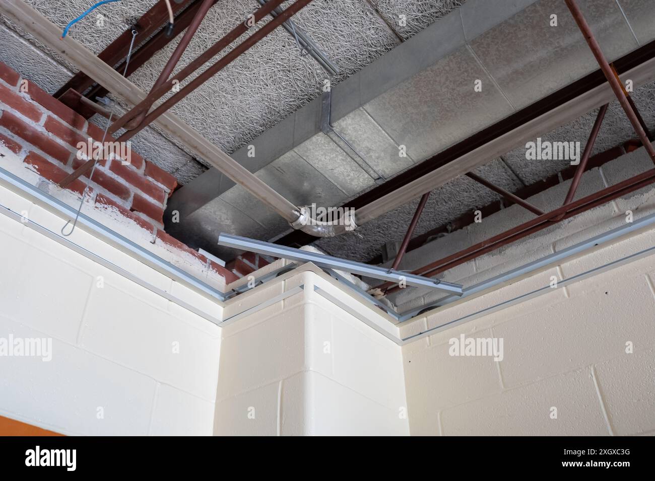 Old ceiling mounted glass drain, vent, pipes in school science room or ...