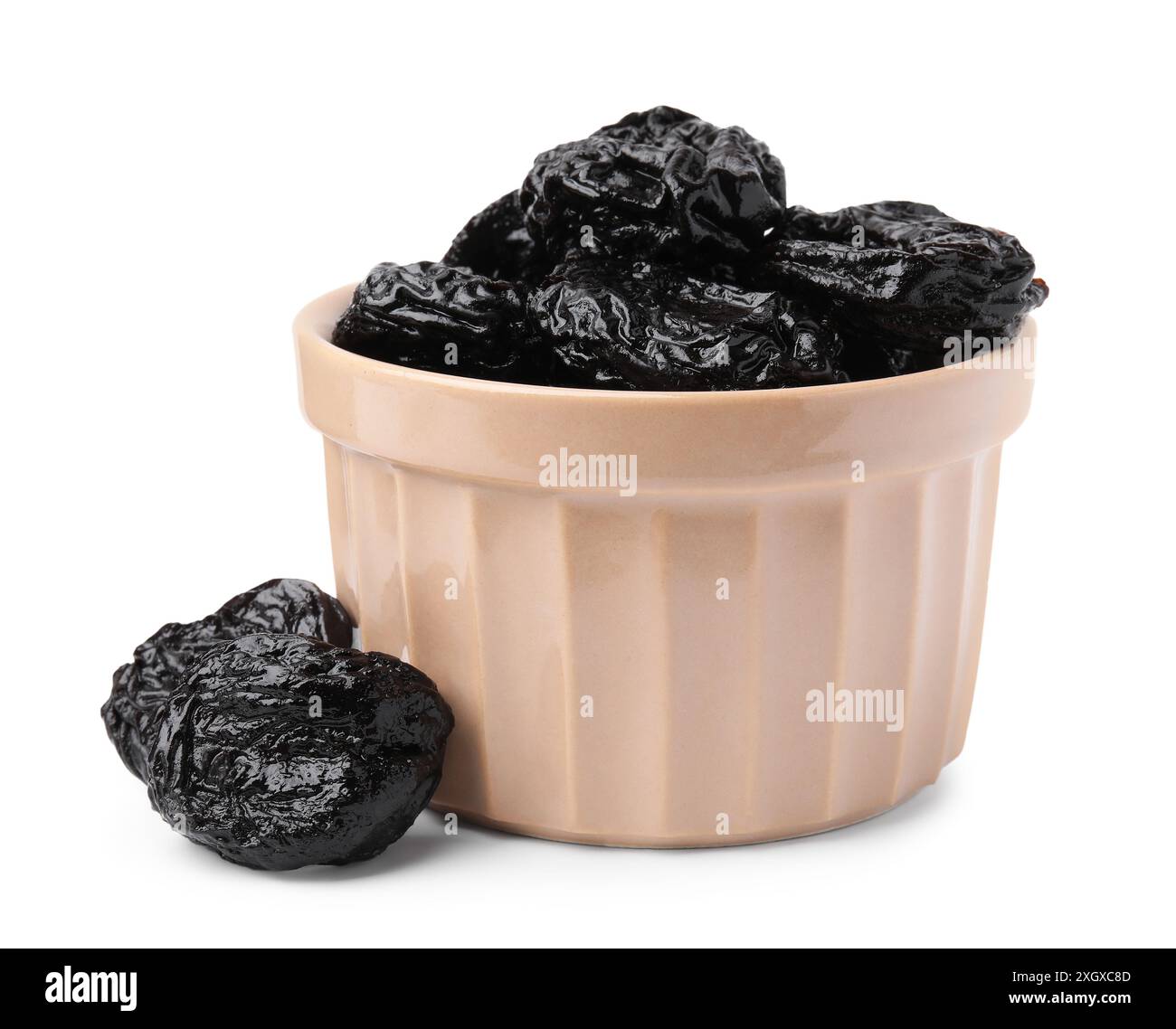 Organic dried prunes in Cut Out Stock Images & Pictures - Alamy