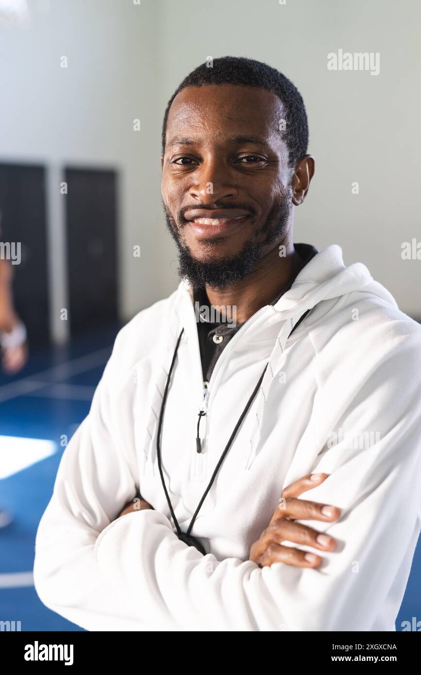 Confident African American basketball coach, embodying both sport and ...