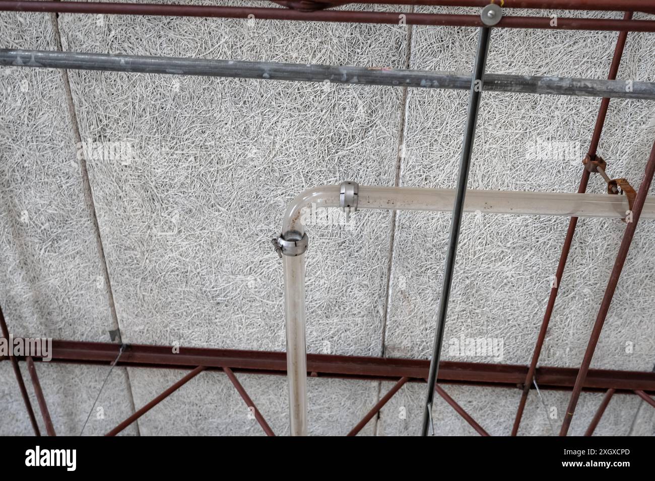 Old ceiling mounted glass drain, vent, pipes in school science room or ...