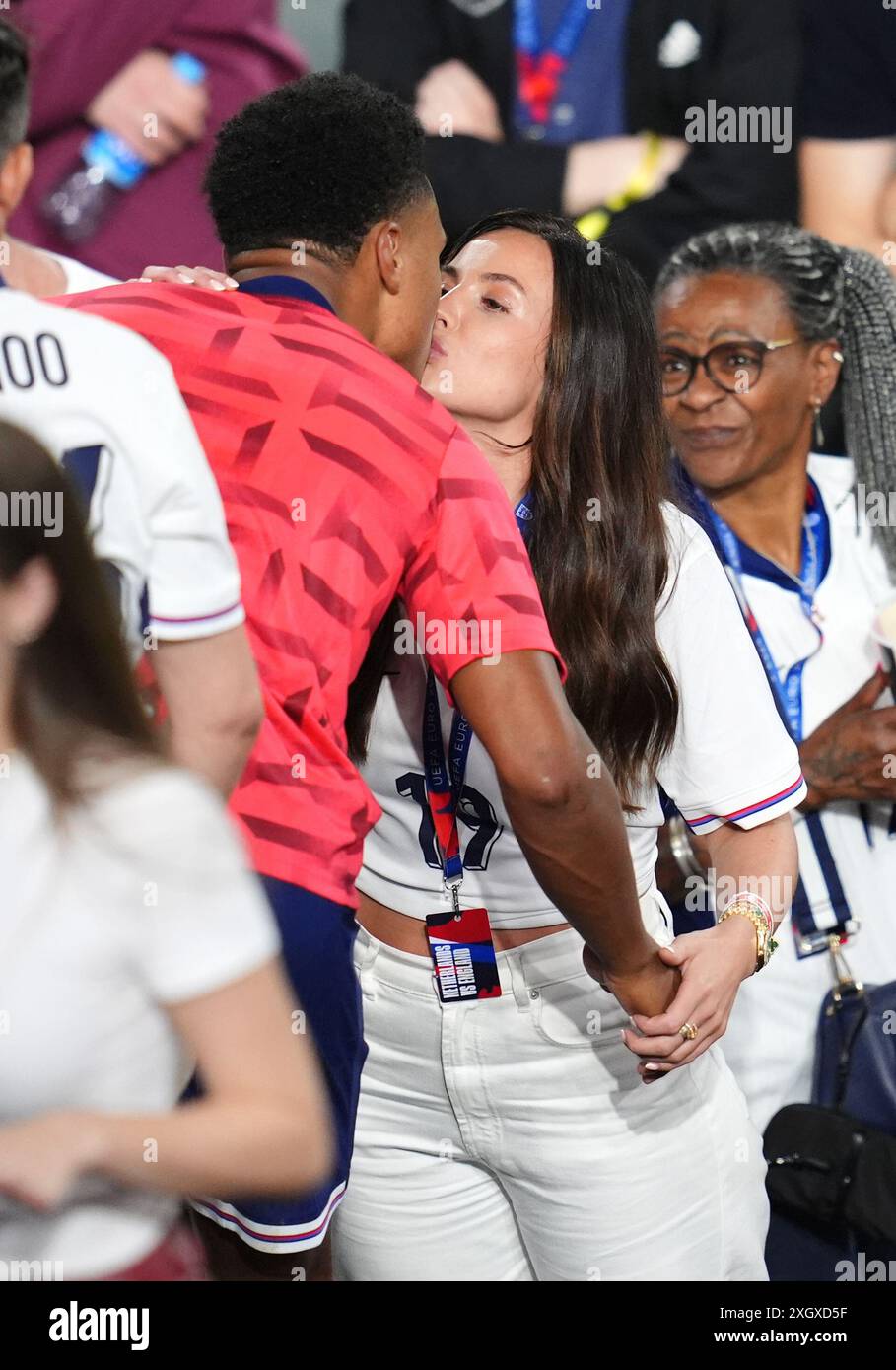 England's Ollie Watkins kisses partner Ellie Alderson after victory in ...