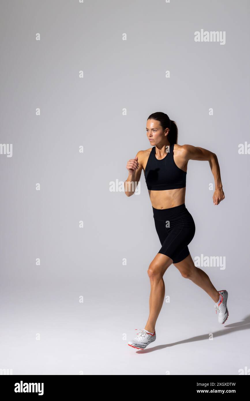 Young athletes sprinting intense determination hi-res stock photography ...