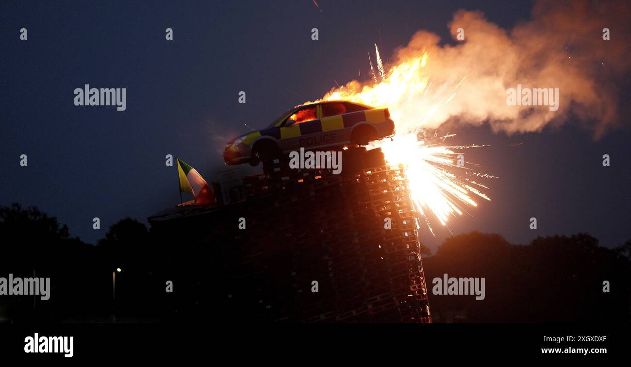 A mock police car isis set alight on top of a Bonfire in Moygashel near ...