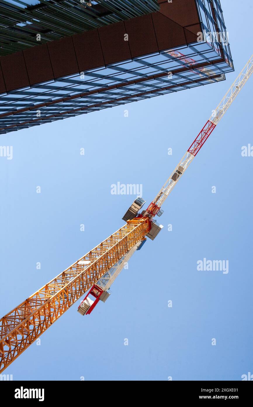 Upward View of Yellow Construction Crane and Building Stock Photo - Alamy