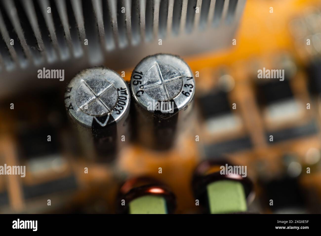 A Close-up of a capacitor in one motherboard Stock Photo - Alamy