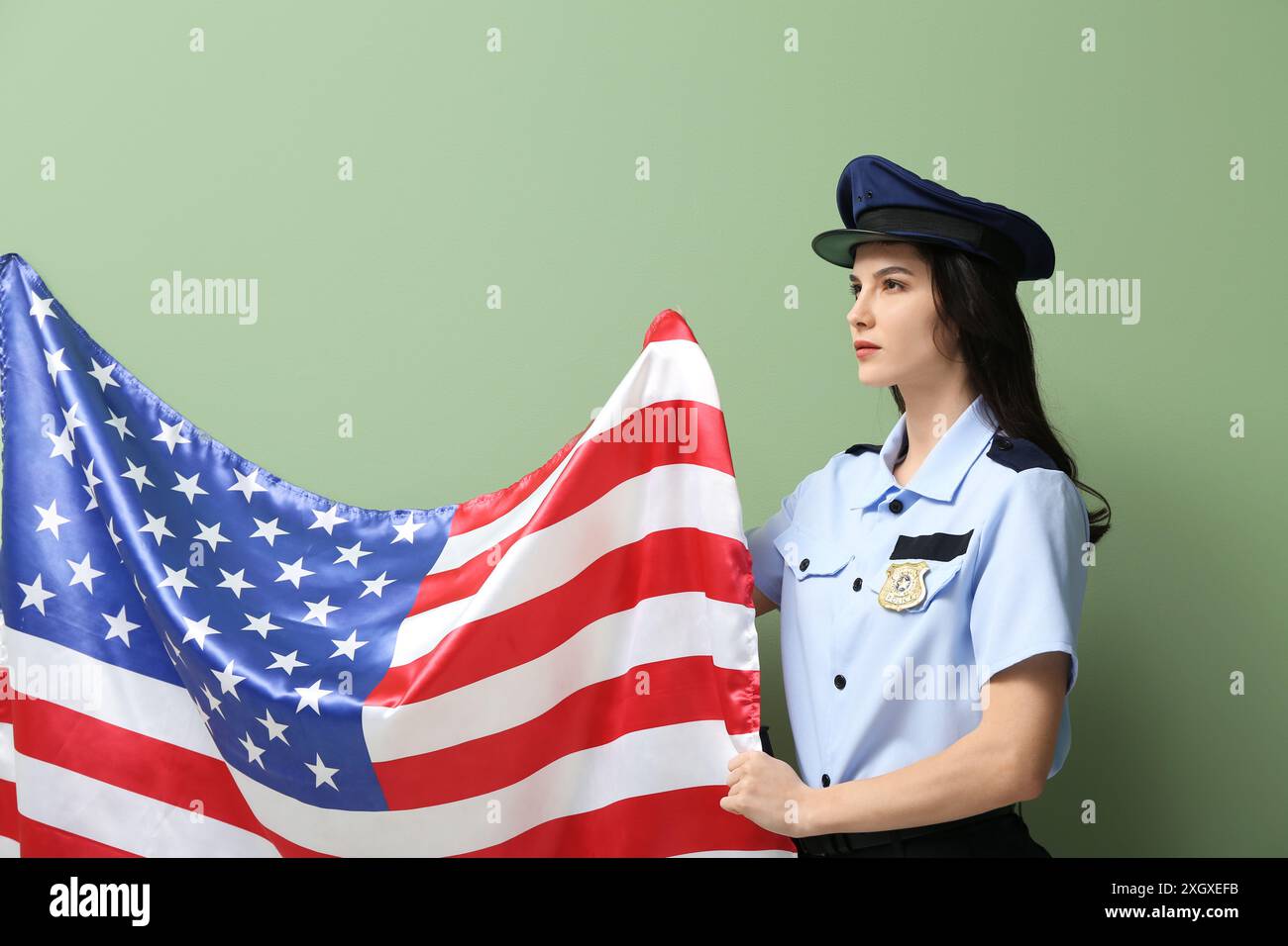 Portrait police woman in green hi-res stock photography and images - Alamy