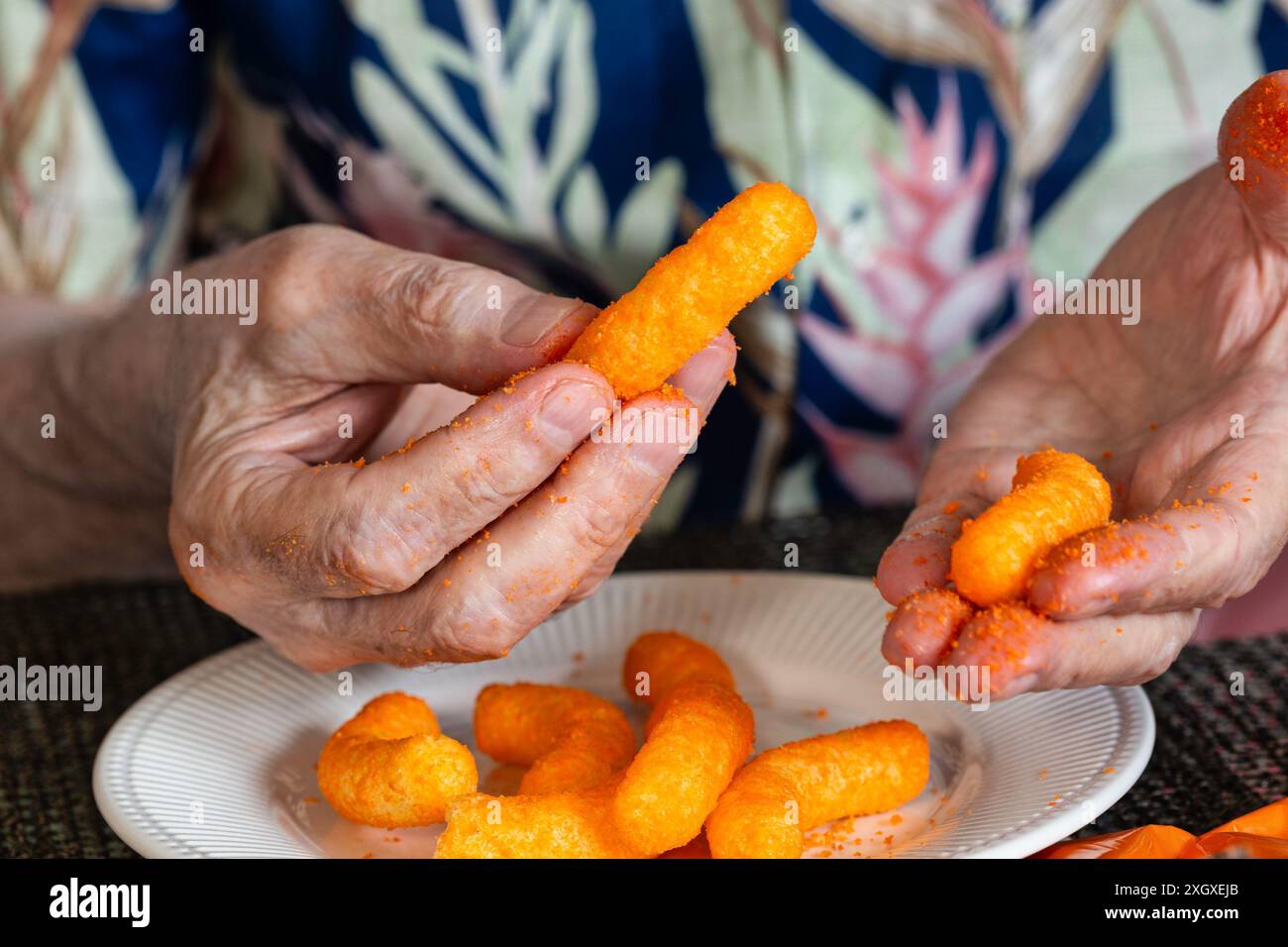 Cheetos fingers hi-res stock photography and images - Alamy