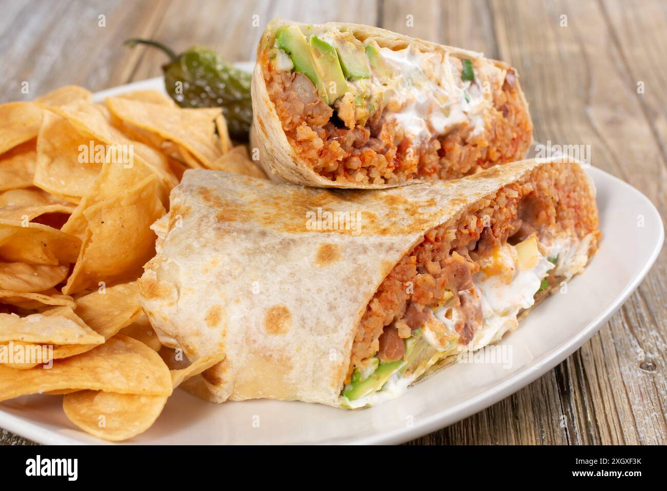 A closeup view of a burrito plate Stock Photo - Alamy