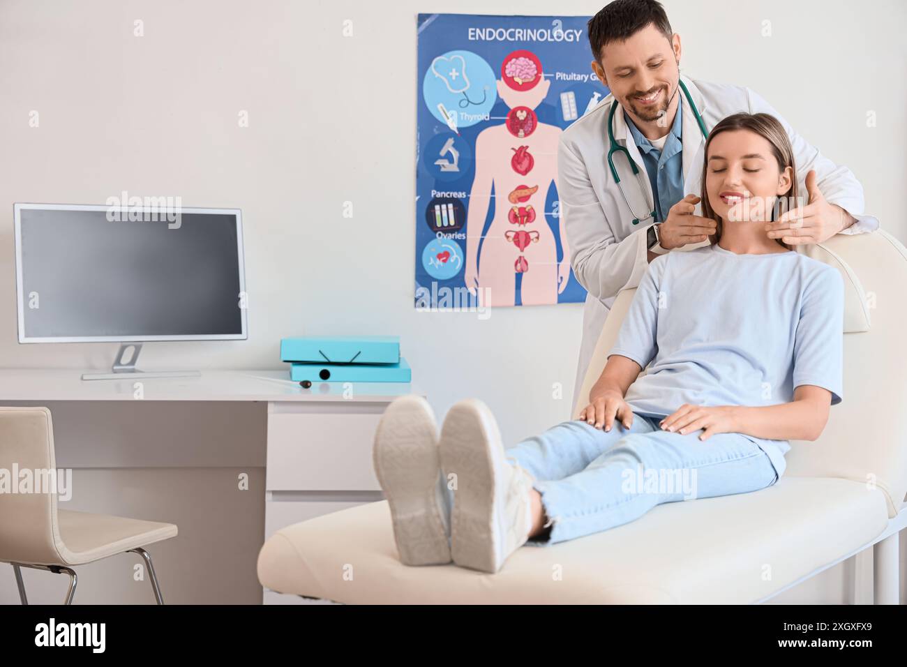 Male endocrinologist examining thyroid gland of young woman in clinic ...
