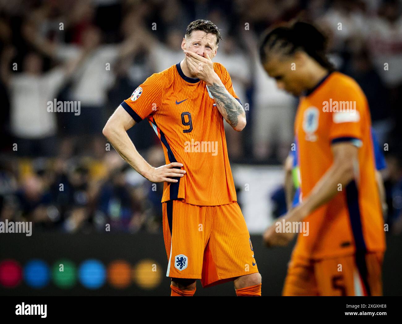 DORTMUND - Wout Weghorst and Nathan Ake (l-r) after the UEFA EURO 2024 ...
