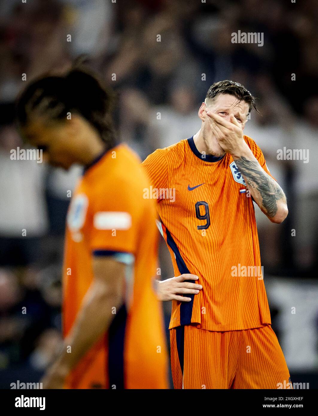 DORTMUND - Nathan Ake and Wout Weghorst (l-r) after the UEFA EURO 2024 ...