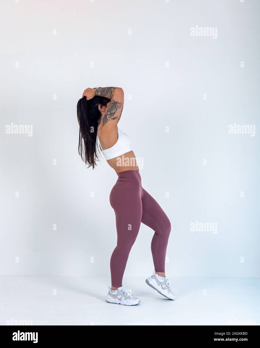 Italian fitness model in a studio fitness shoot Stock Photo - Alamy