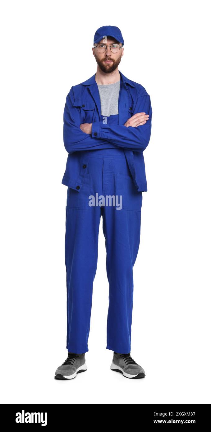 Professional auto mechanic in blue uniform on white background Stock ...