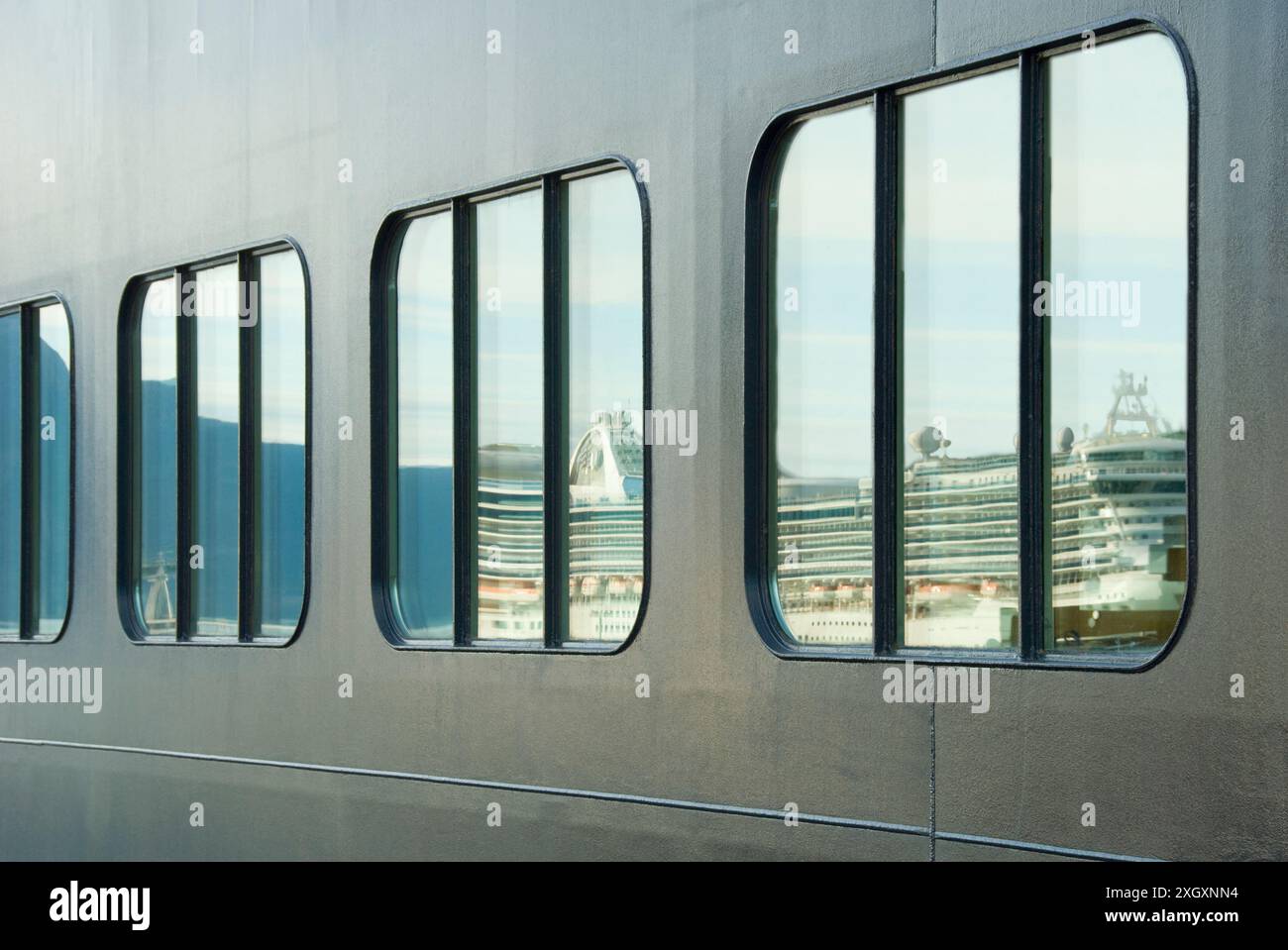 Cruise ship reflected into cruise ship windows - Skagway, Alaska Stock ...