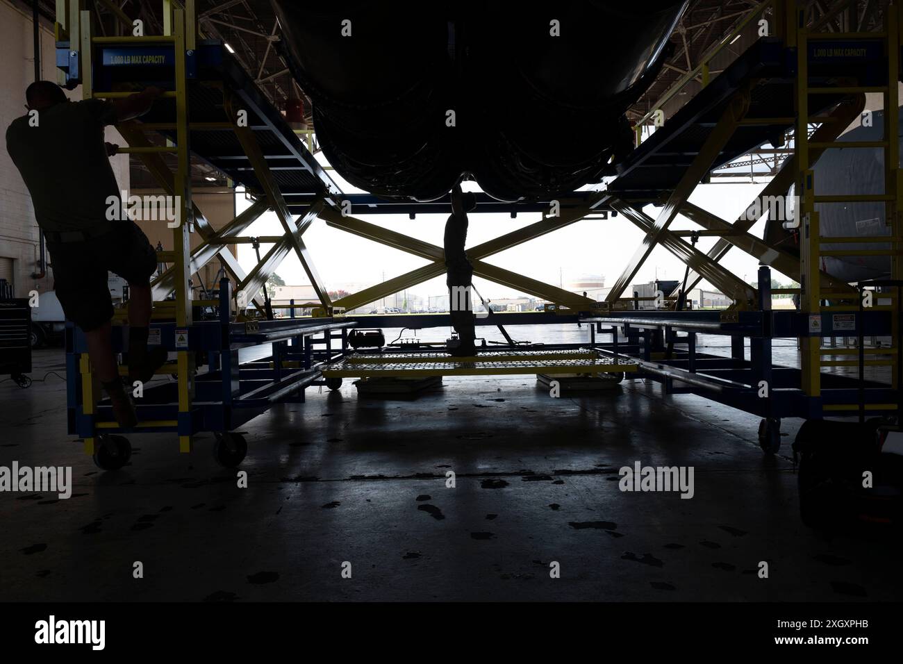 U.S. Airmen assigned to the 307th Maintenance Squadron use a new Engine ...