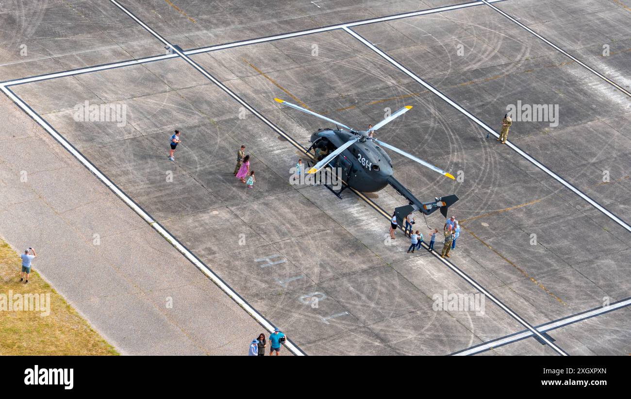 Families gather around a UH-72 Lakota at Toth Stagefield on May 2, 2024 ...
