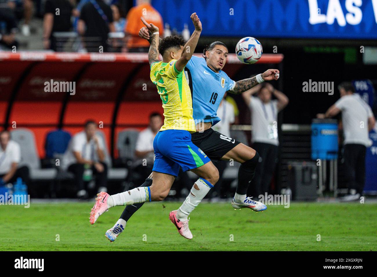 Uruguay forward Darwin Núñez (19) and Brazil midfielder João Gomes (15 ...