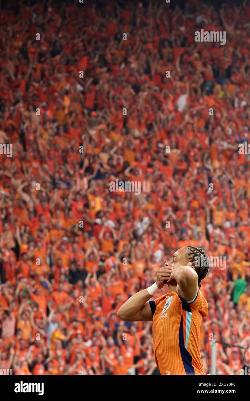 Dortmund. 10th July, 2024. Xavi Simons of the Netherlands celebrates ...