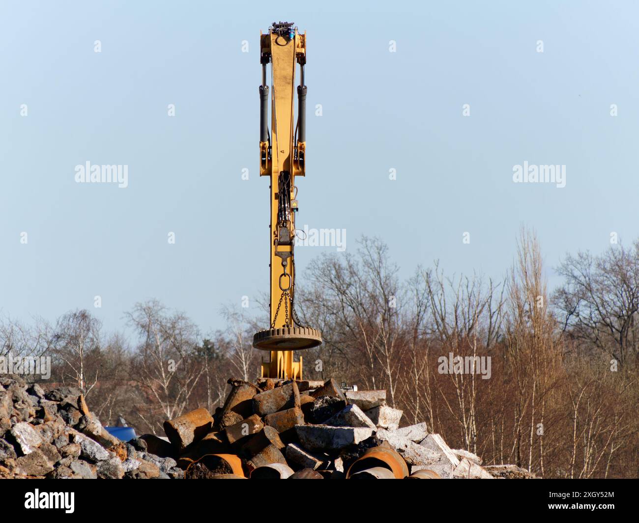 Magnetic crane at a scrap yard at an industrial port, Dortmund, Germany ...