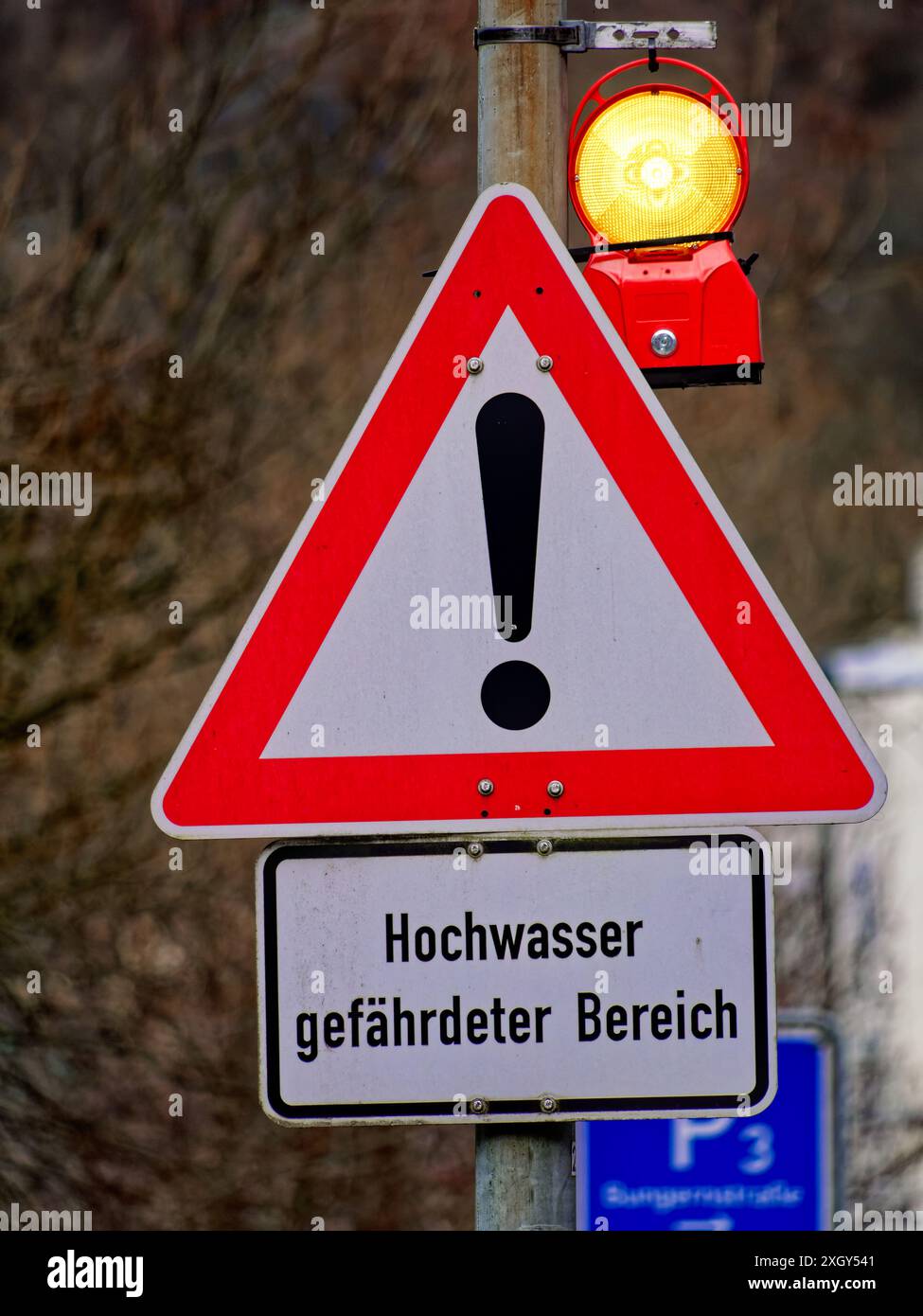 Warning sign for an area at risk of flooding on the Lenne river in ...