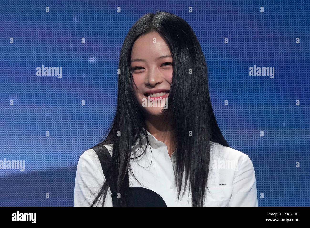 Hanni, a member of K-pop group NewJeans, smiles during the Korea ...