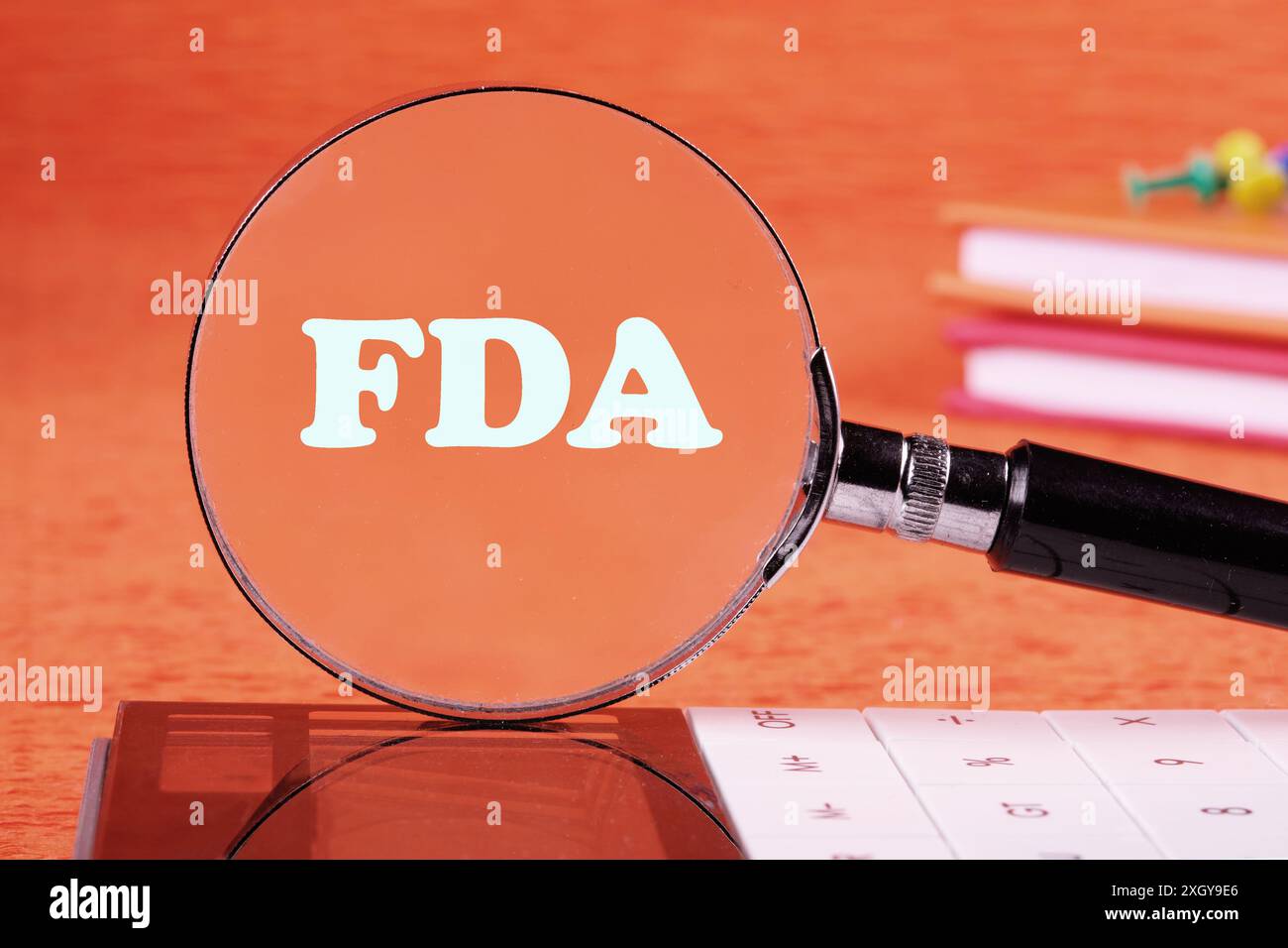 FDA Food Drug Administration symbol through a magnifying glass on an ...