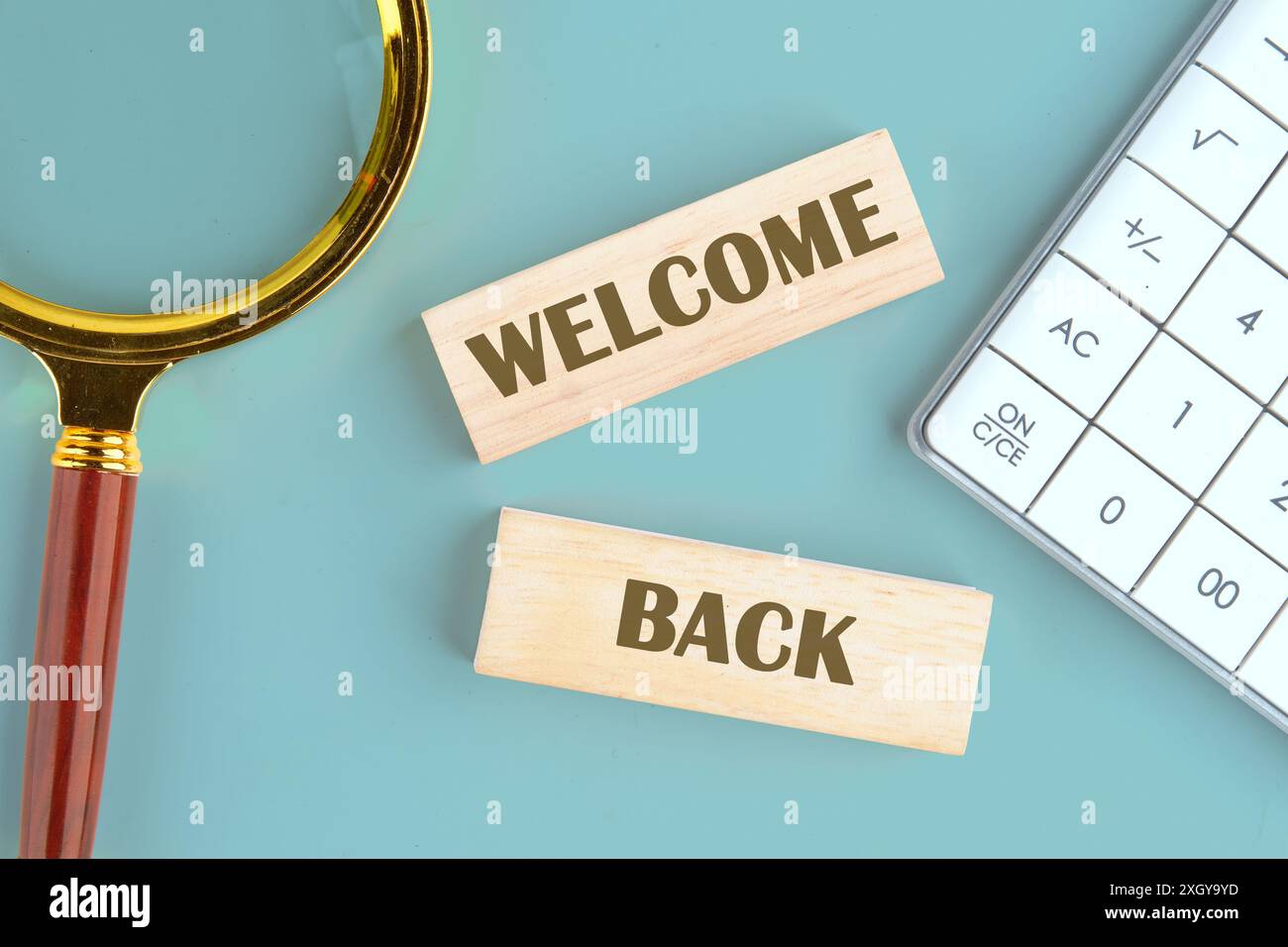 Concept background. Welcome Back text on wooden blocks in a composition ...