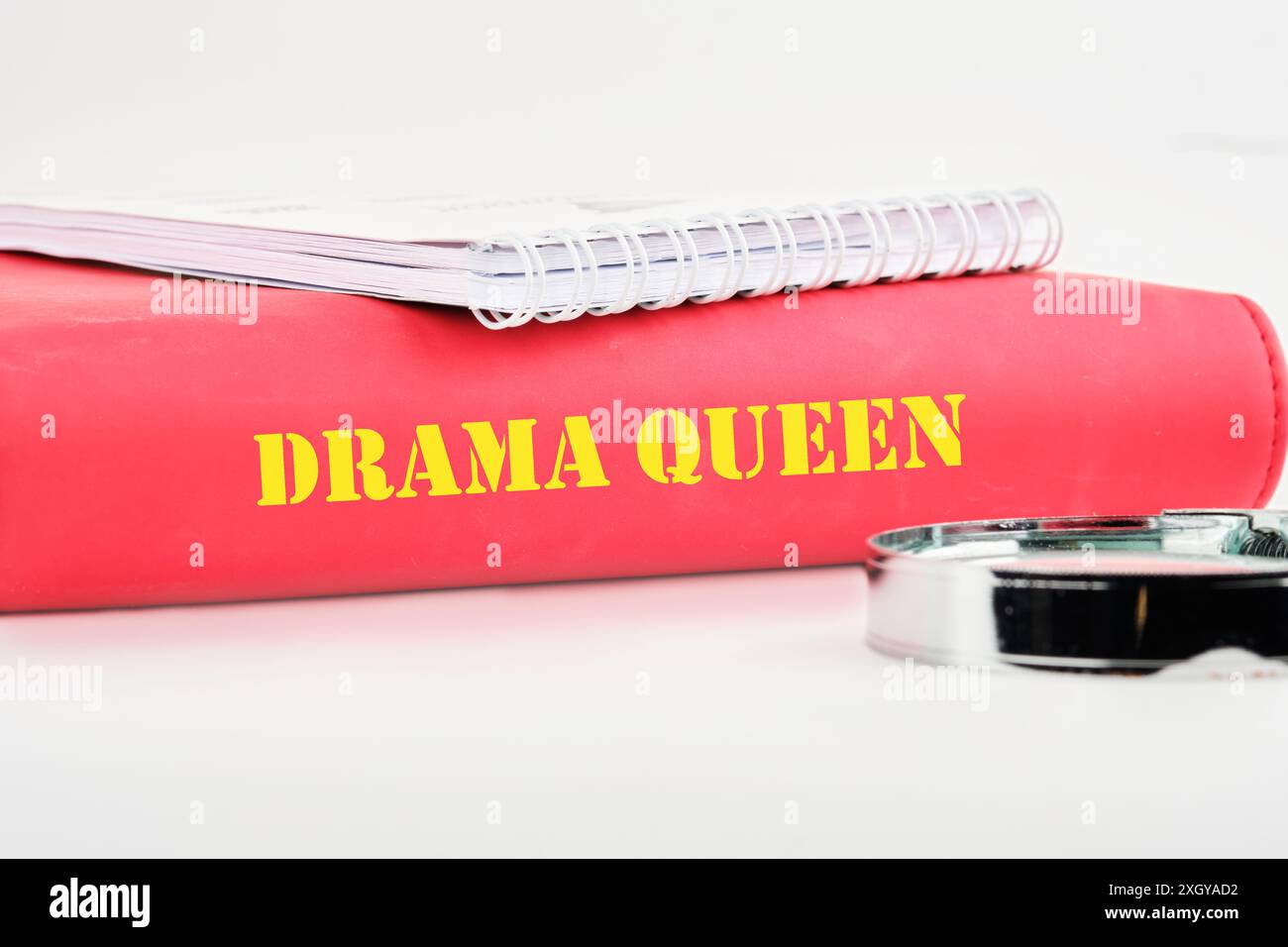 Drama queen words on the cover of the book on a white background Stock ...