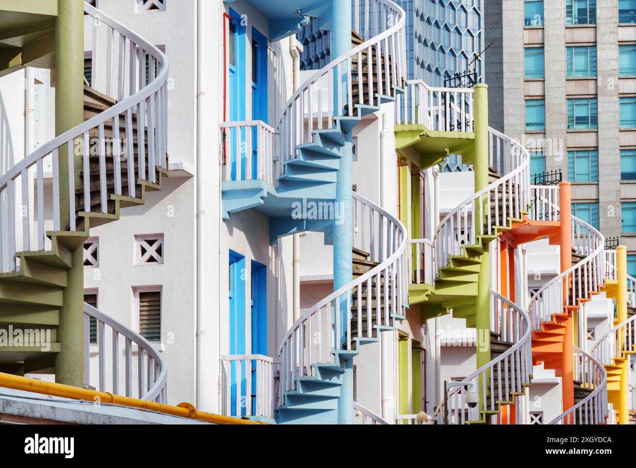 Amazing colorful exterior spiral staircases outside a whitewashed ...