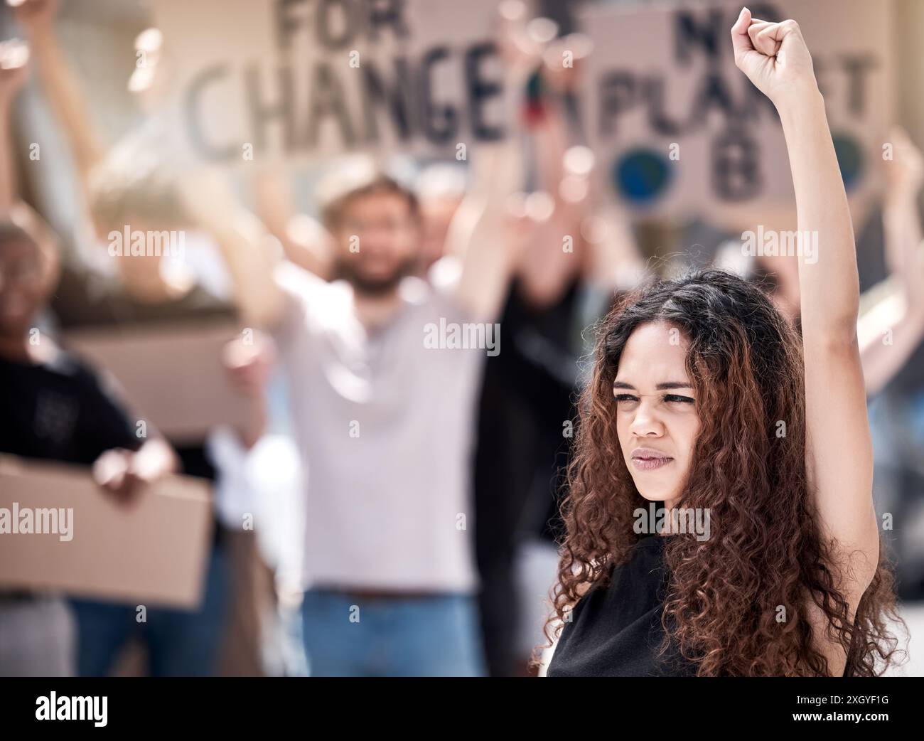 Angry, woman and protest with fist in group for climate change ...