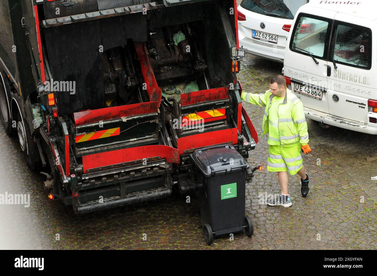 Copenhagen/ Denmark/11 july 2024/Male loading waste and garbage in ...
