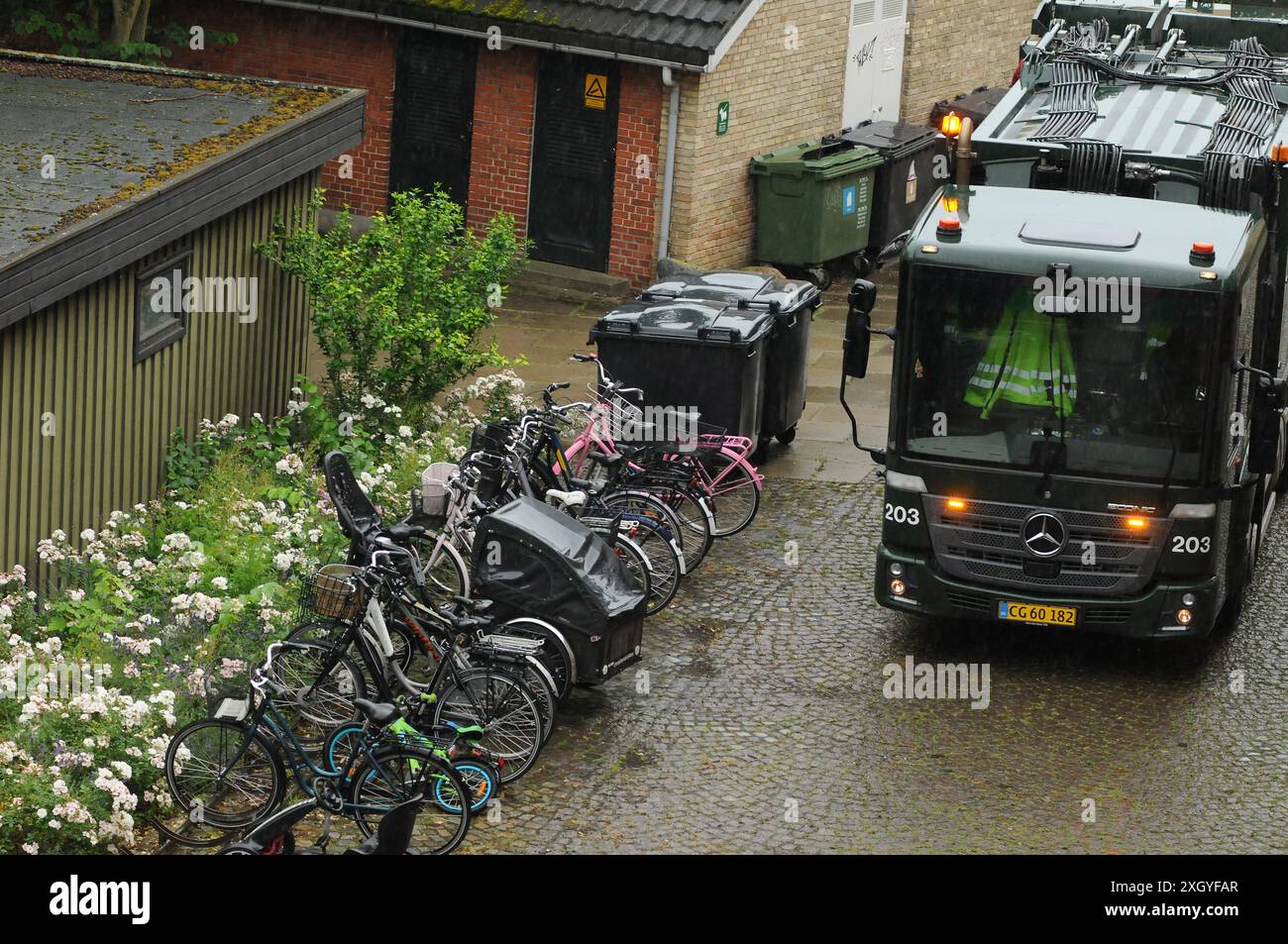 Copenhagen/ Denmark/11 july 2024/Male loading waste and garbage in ...