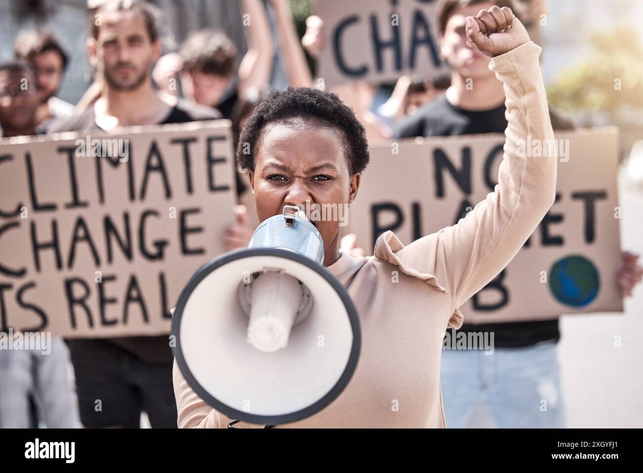 Angry black woman, megaphone and protest with community for climate ...