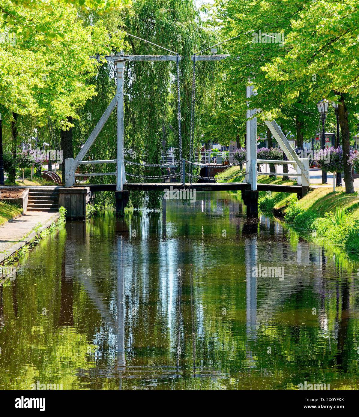 Papenburg main canal in Emsland, view of a bridge over the water canal ...