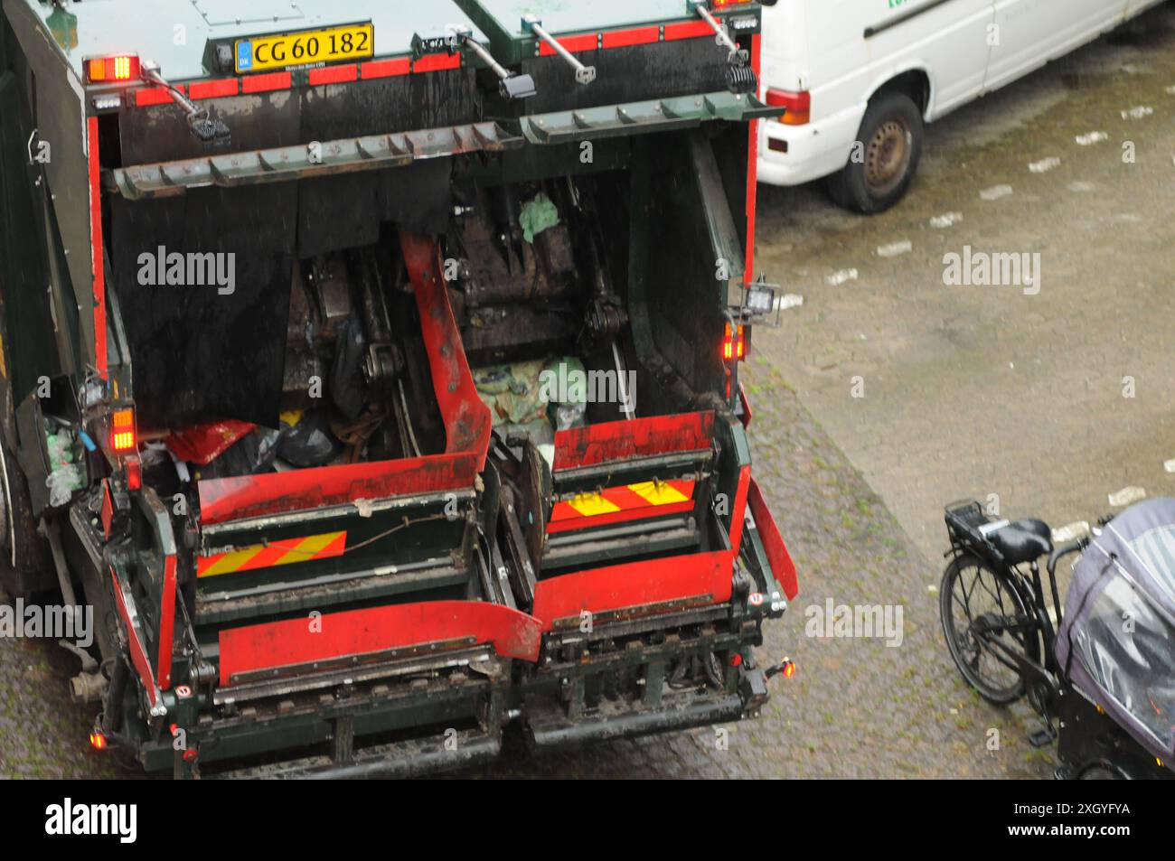Copenhagen/ Denmark/11 july 2024/Male loading waste and garbage in ...