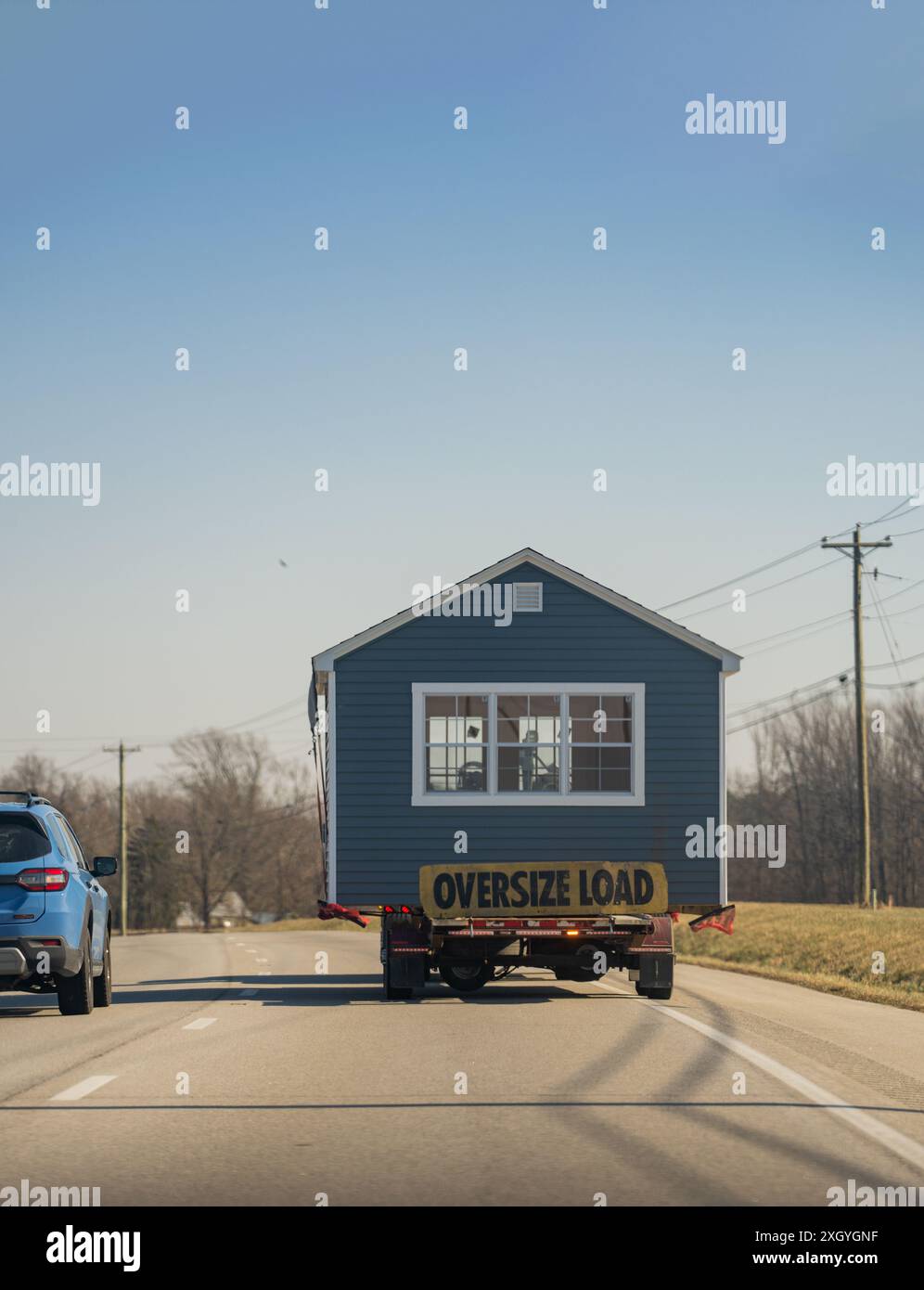 Oversize load. Manufactured house transported on the highway. Mobile ...