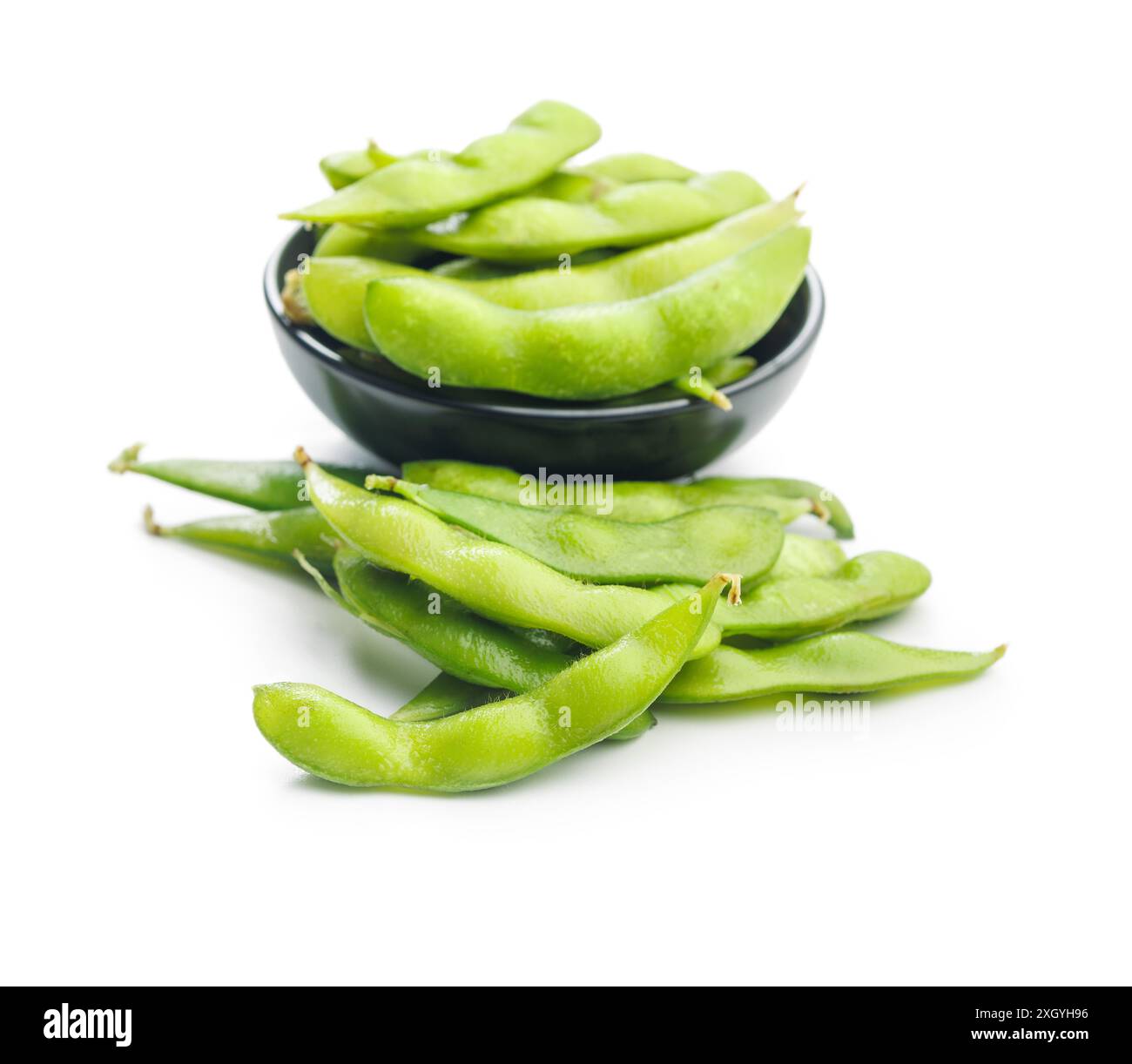 Green edamame pods. Fresh soybeans in bowl isolated on a white ...