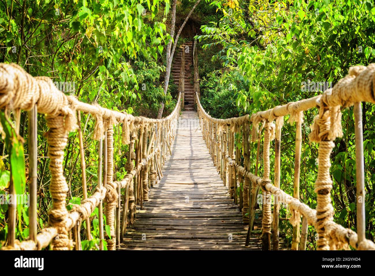 Amazing simple suspension bridge over gorge. Scenic footbridge made ...