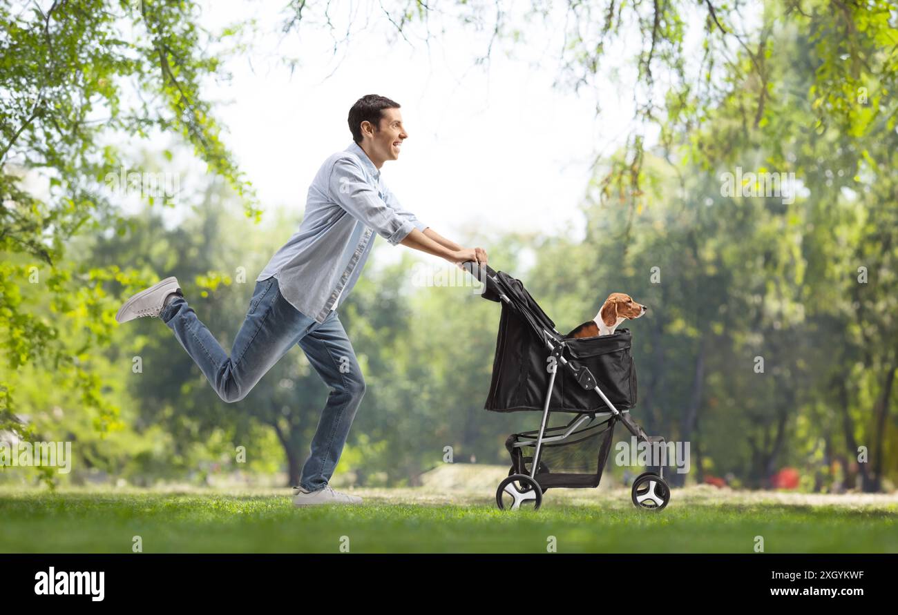 Young man pushing pram hi-res stock photography and images - Alamy