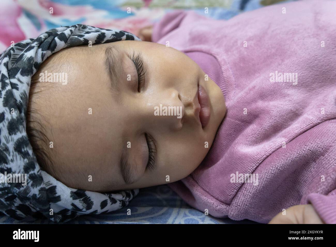 cute toddler innocent sleeping portraits at indoor from flat angle ...