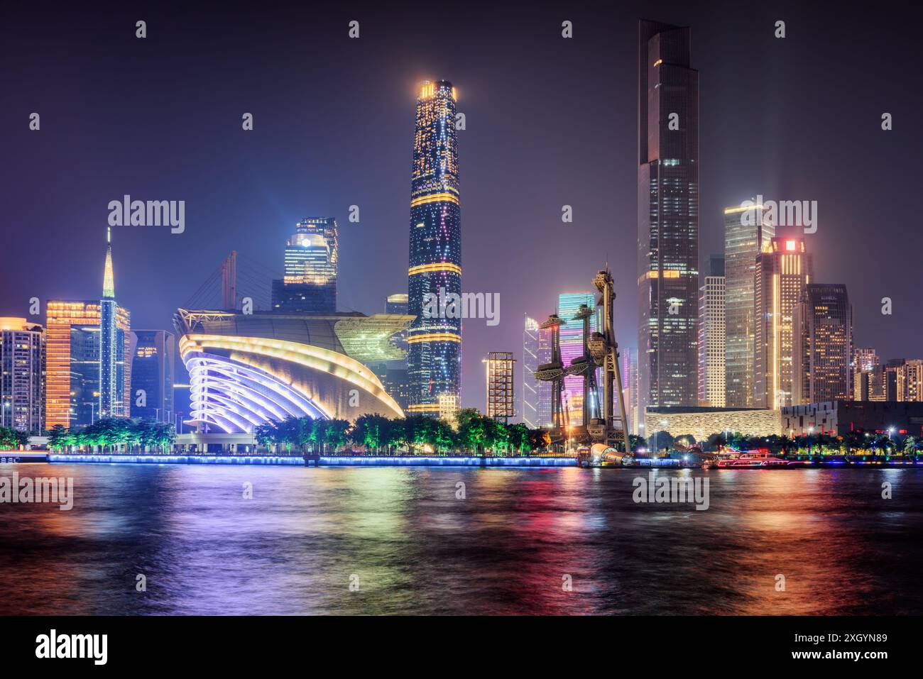 Night view of skyscrapers and other modern buildings at the Tianhe ...