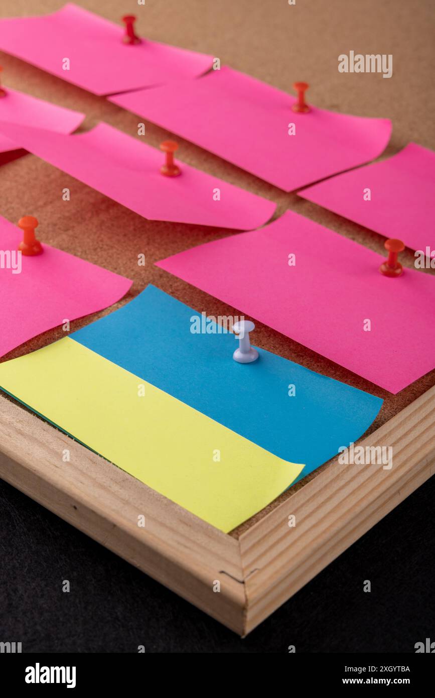 A vibrant image captures a collection of Post-it notes arranged to form ...
