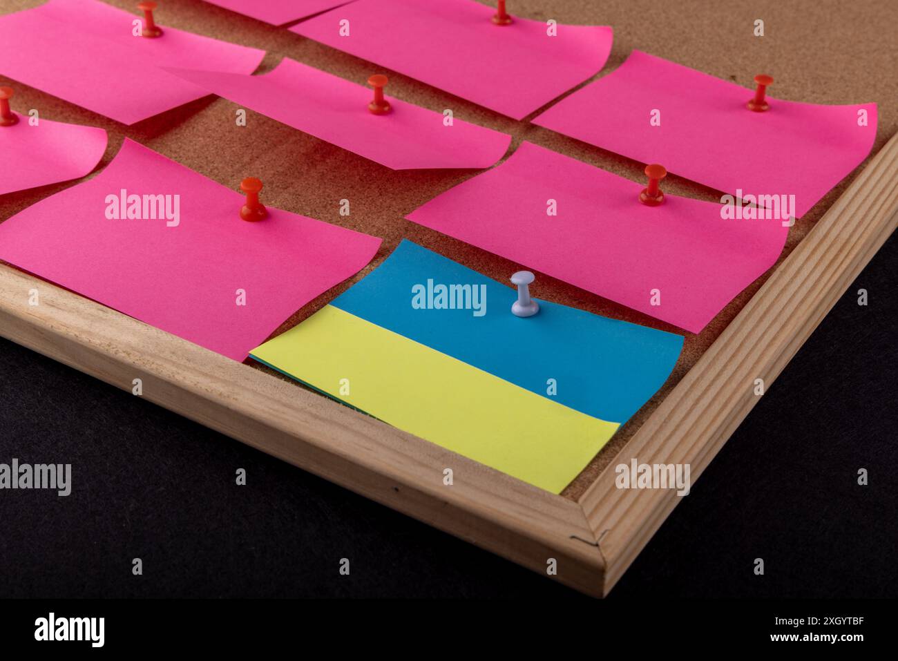 A vibrant image captures a collection of Post-it notes arranged to form ...