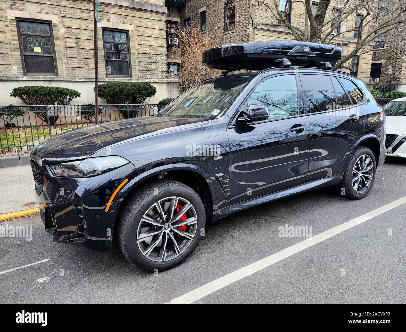 New York City, USA - February 10, 2024: BMW X5 with roof box parked ...
